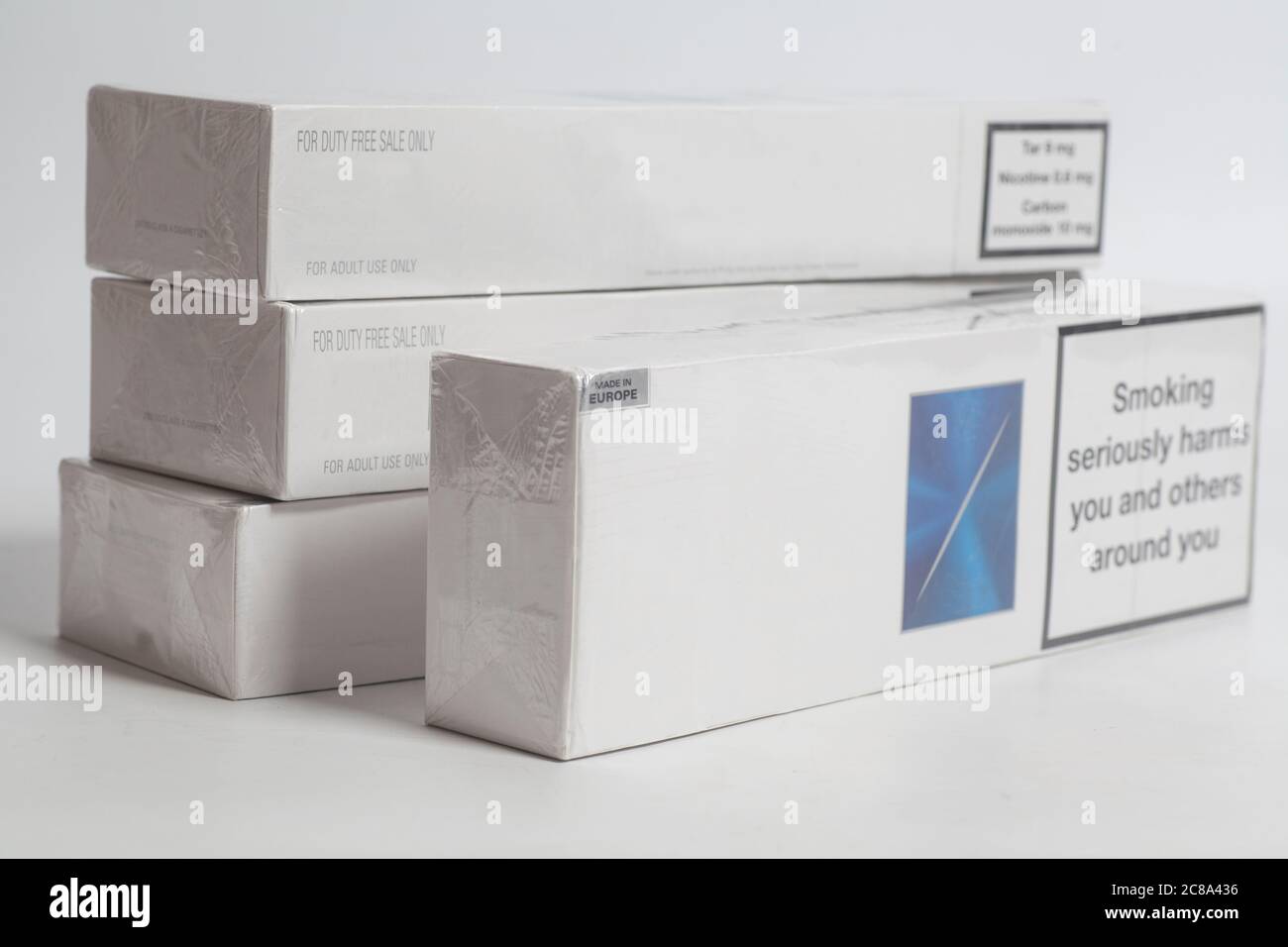 Carton of cigarettes, on white background Stock Photo - Alamy
