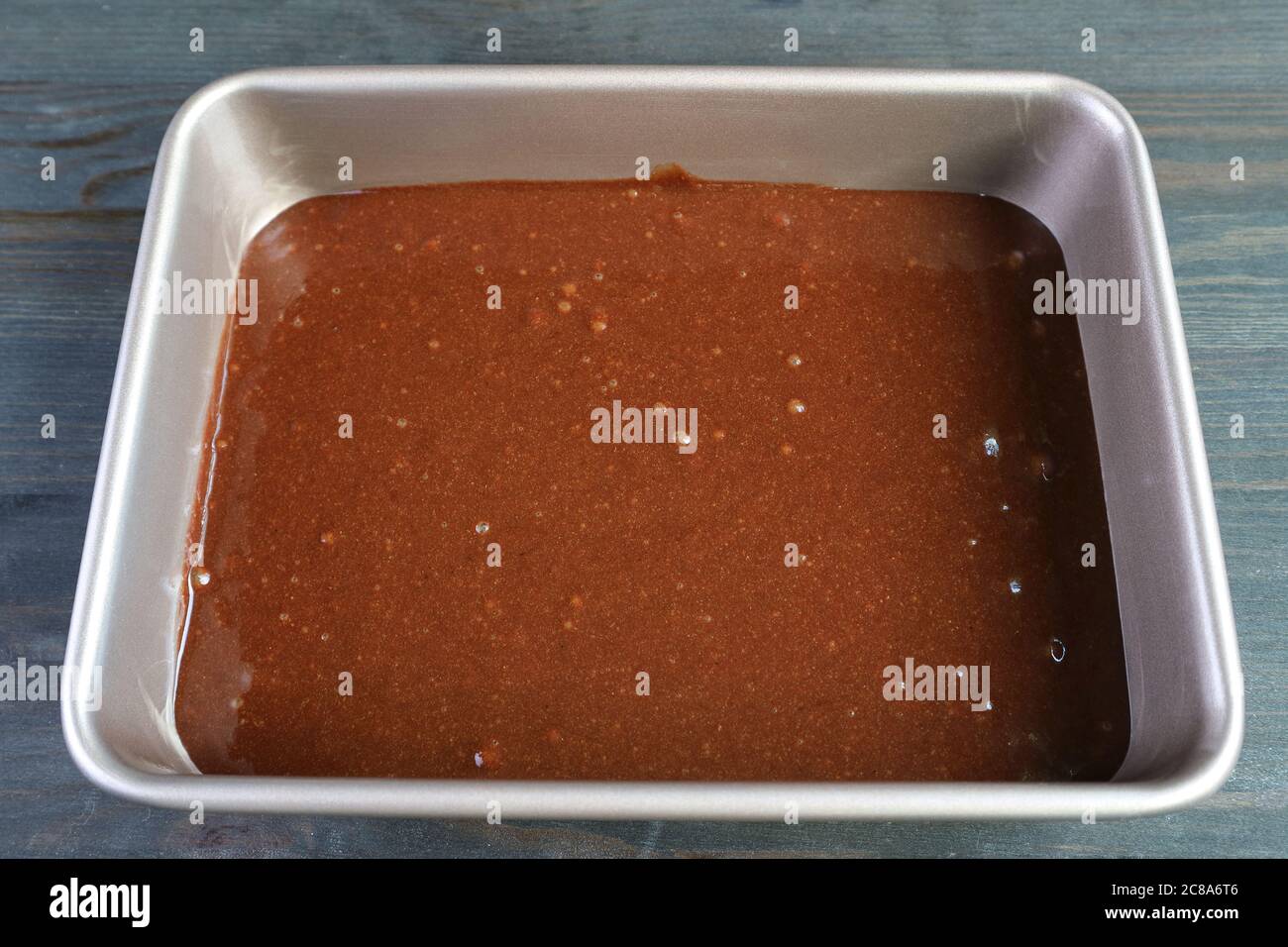 Cake batter in the pan hi-res stock photography and images - Alamy