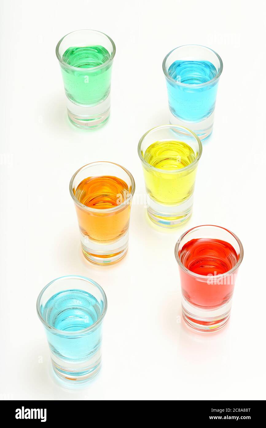 six colorful cocktail shots on white Stock Photo - Alamy