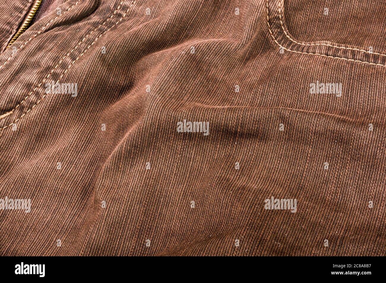 clothing items stonewashed cotton fabric texture with seams, clasps ...