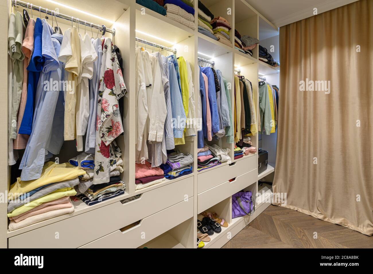 Large woman's wardrobe Stock Photo - Alamy