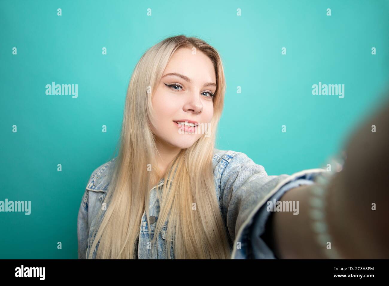 Romantic Long Haired Woman Taking Selfie Looking At Phone Camera Enjoying Her Beauty And Youth