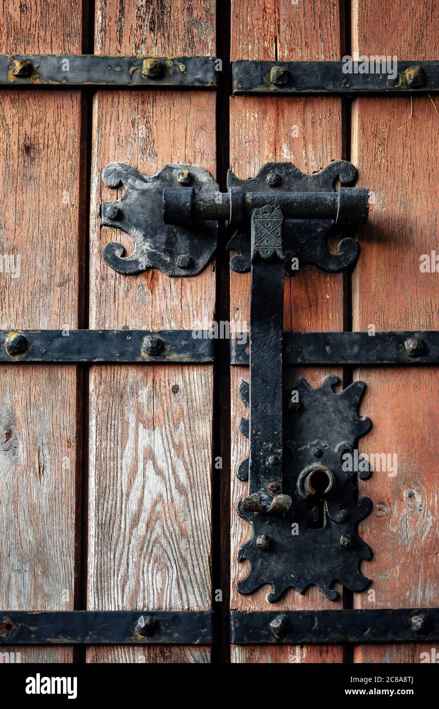 ancient medieval castle door with iron knocker and lock Stock Photo - Alamy