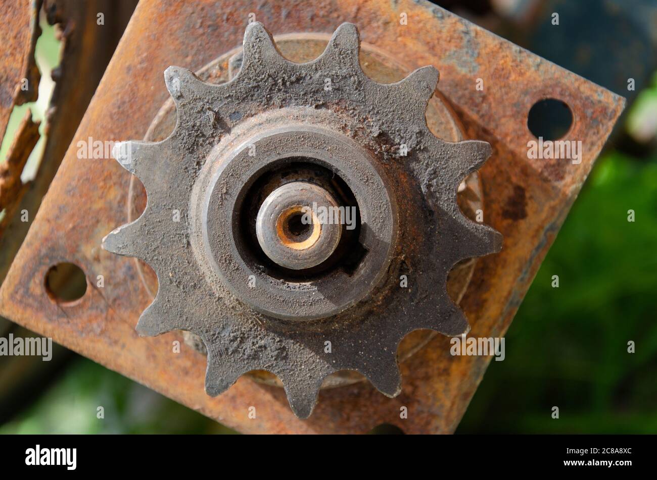 Old rustic machine with cog wheels industrial Stock Photo - Alamy