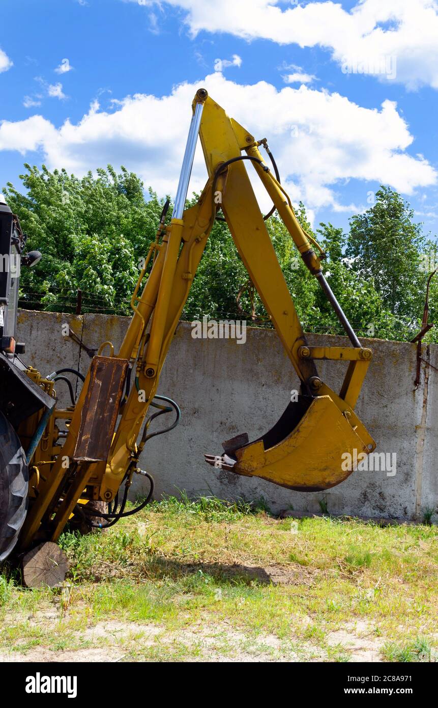Old rusty tractor's flat back tire Stock Photo - Alamy