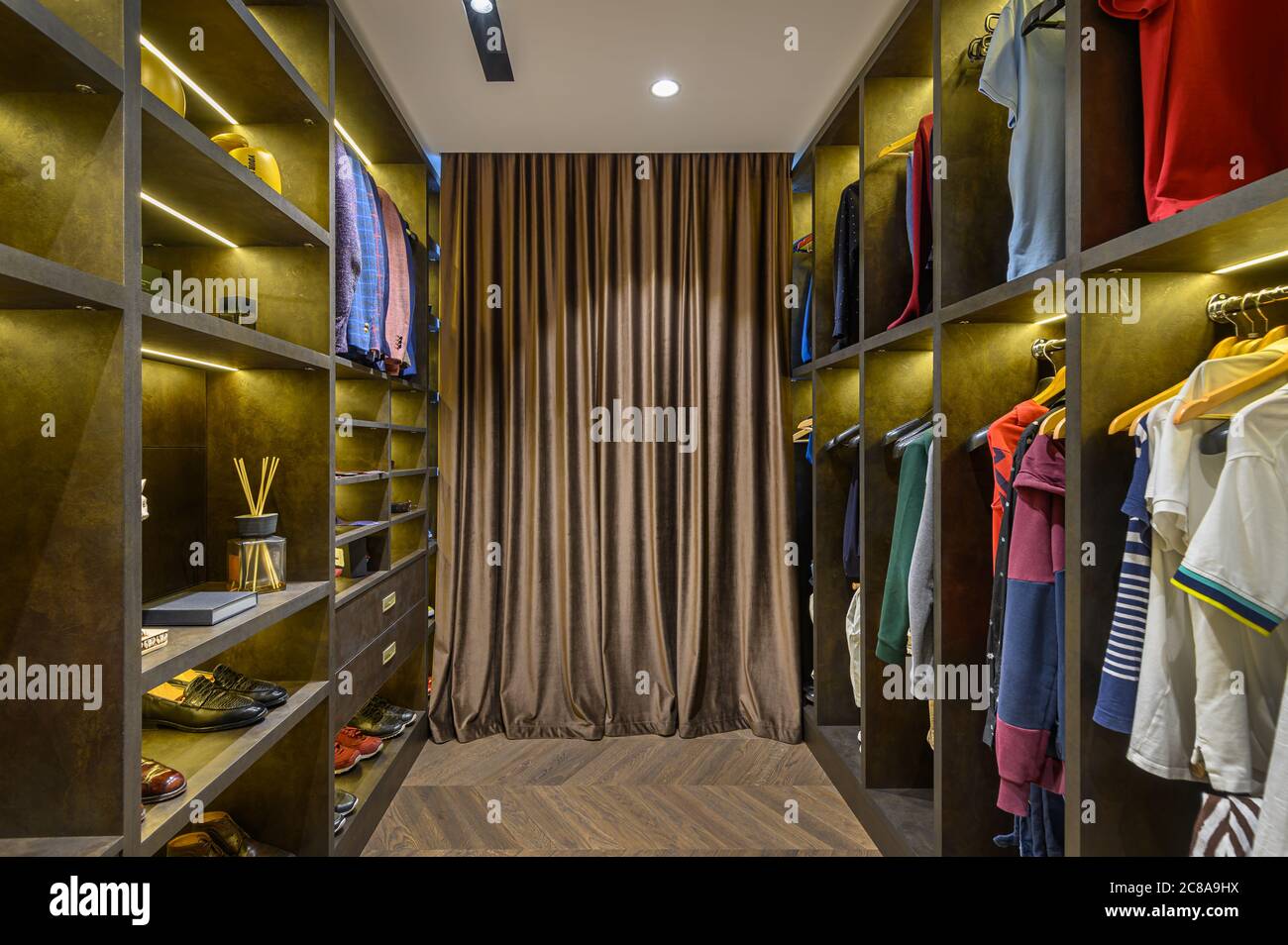 Large luxury men's wardrobe Stock Photo - Alamy