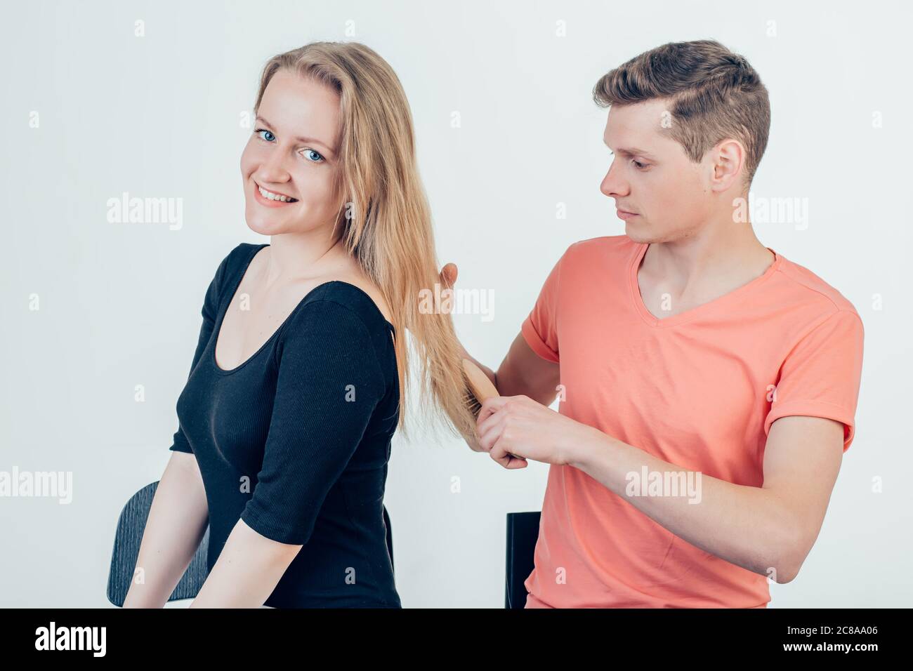 Woman touching boyfriend face with hand hi-res stock photography and ...