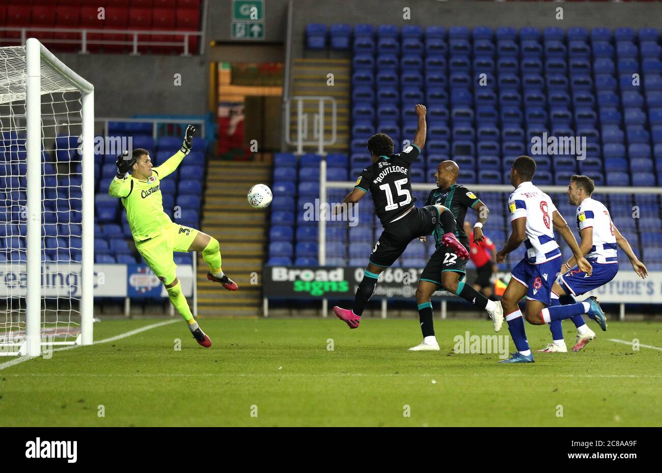 Swansea City's Wayne Routledge (centre) scores his side's fourth goal ...