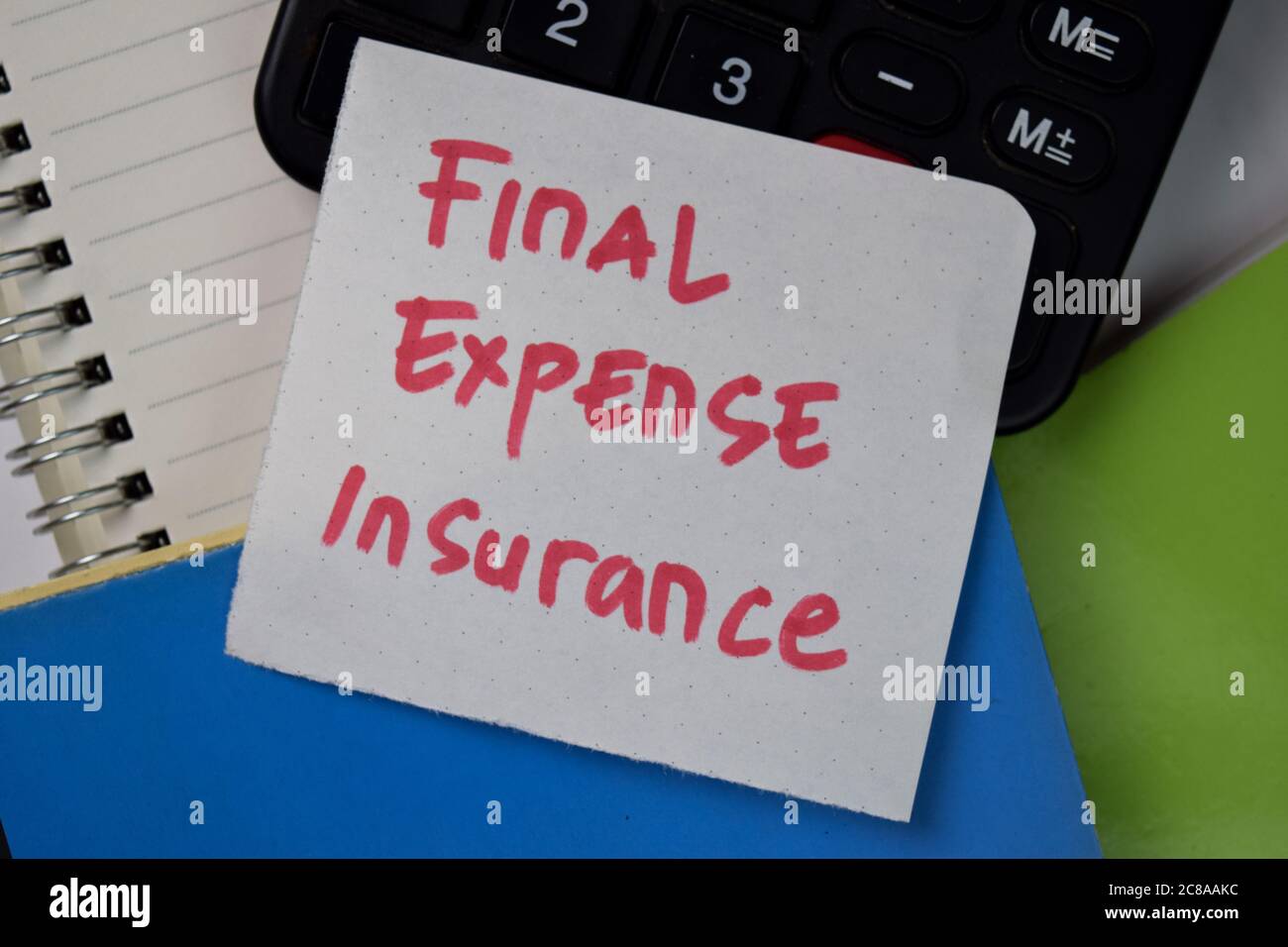 Final Expense Insurance text on sticky notes isolated on office desk ...