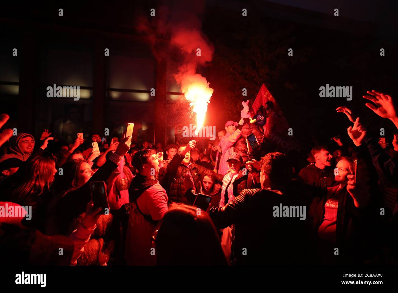 Liverpool fans with flares as their side face Chelsea at Anfield in ...