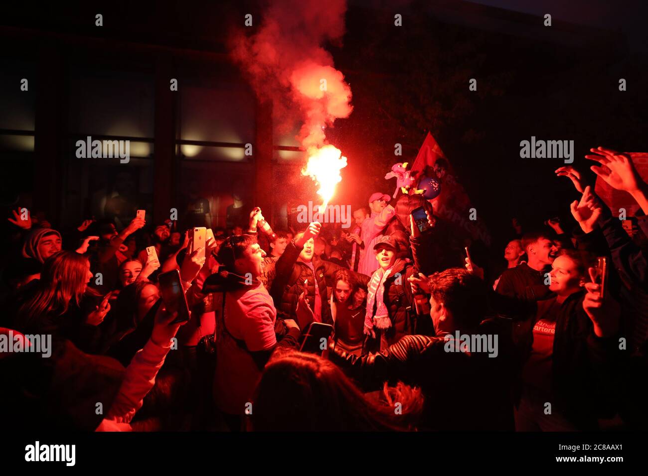 Liverpool fans with flares as their side face Chelsea at Anfield in ...