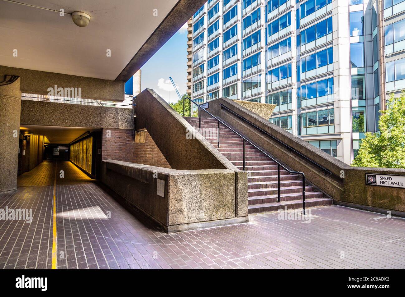 Stairs going up to the Speed highwalk at the brutalist Barbican Estate ...