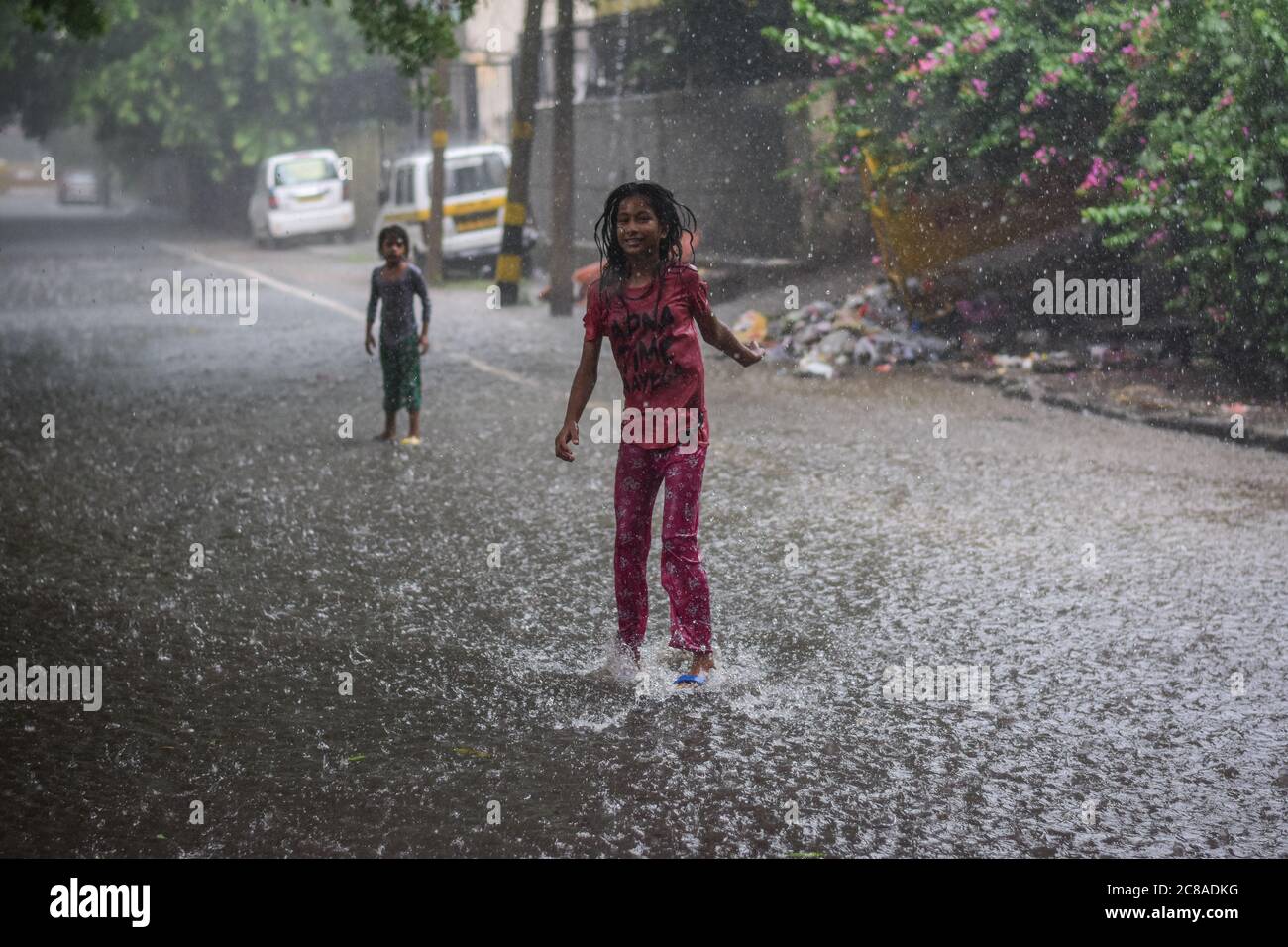 Kids seen playing in the rain, during heavy rainfall in Delhi.Heavy ...
