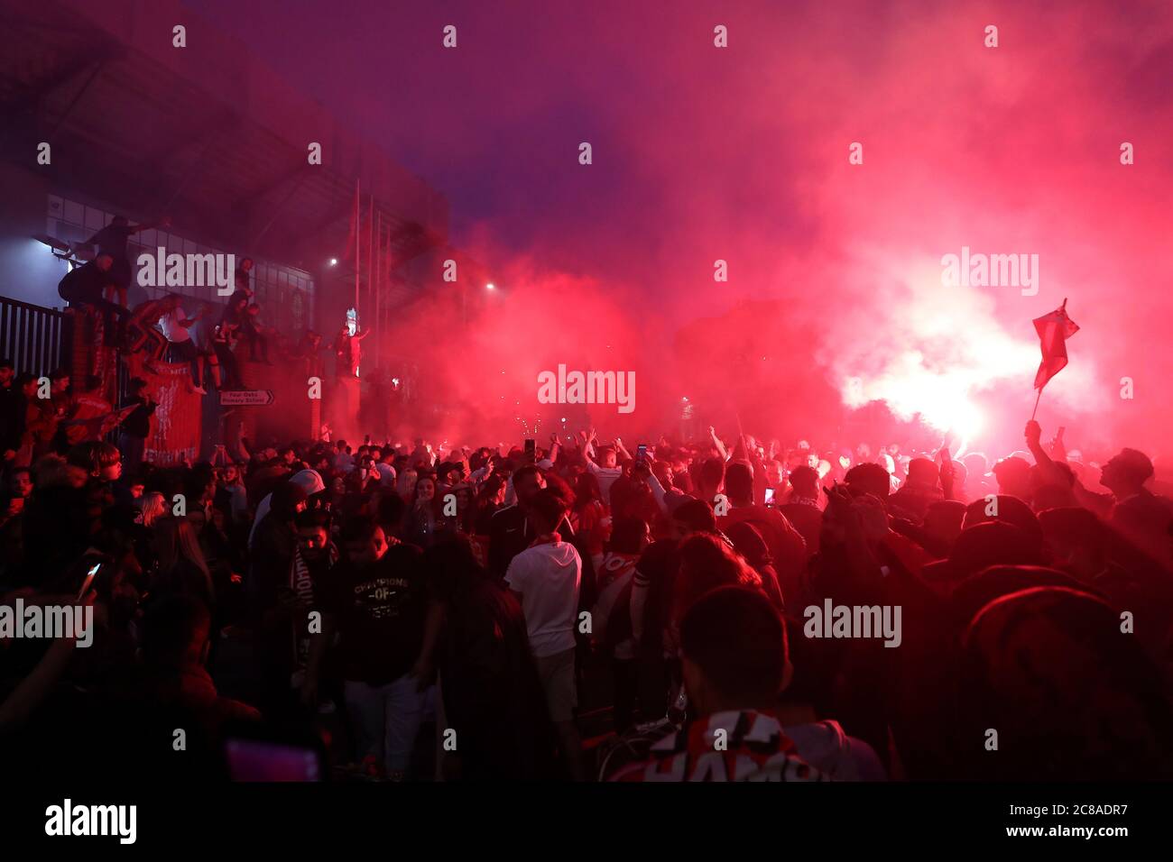 Liverpool fans celebrate outside Anfield Stock Photo - Alamy