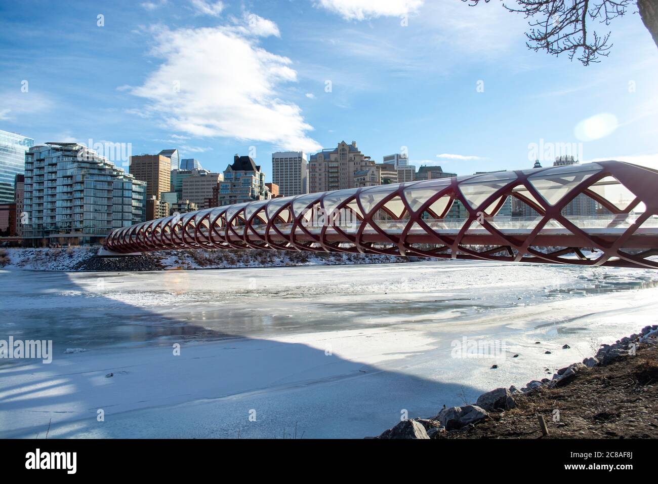 Modern Pedestrian Bridge Across River To Downtown Stock Photo - Alamy