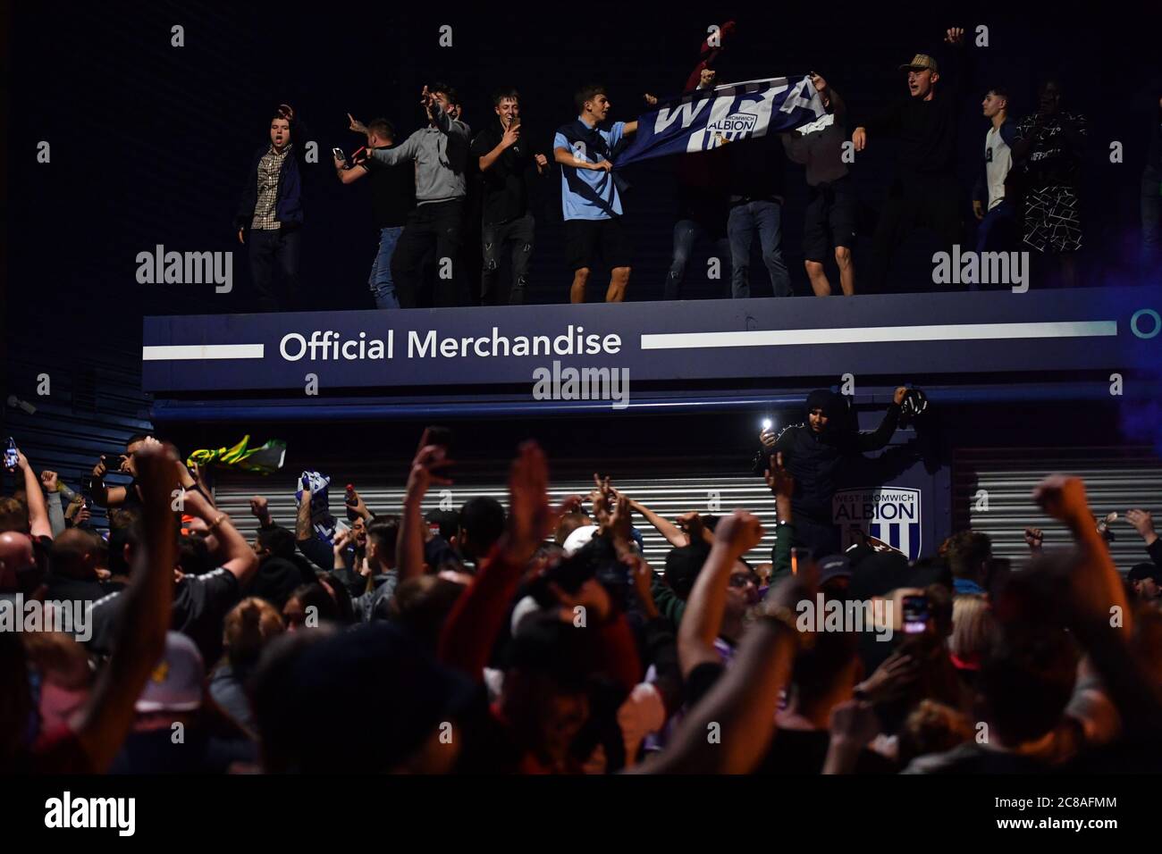 West Bromwich Albion fans celebrates their sides promotion to the ...