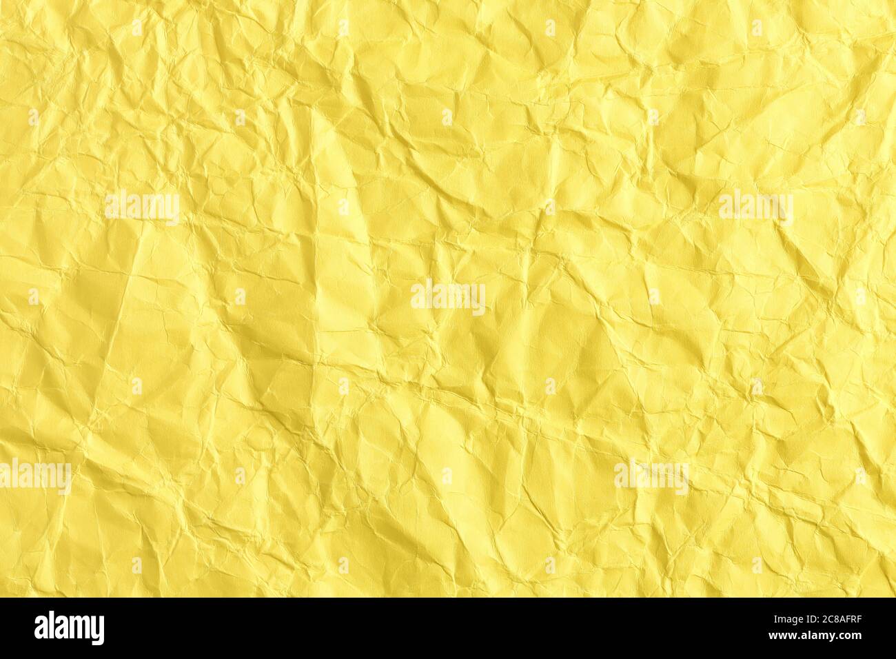 yellow crumpled paper surface for backgrounds Stock Photo - Alamy