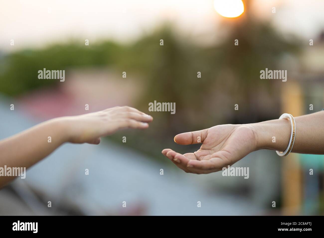 Hand reaching out to another hand hi-res stock photography and images ...