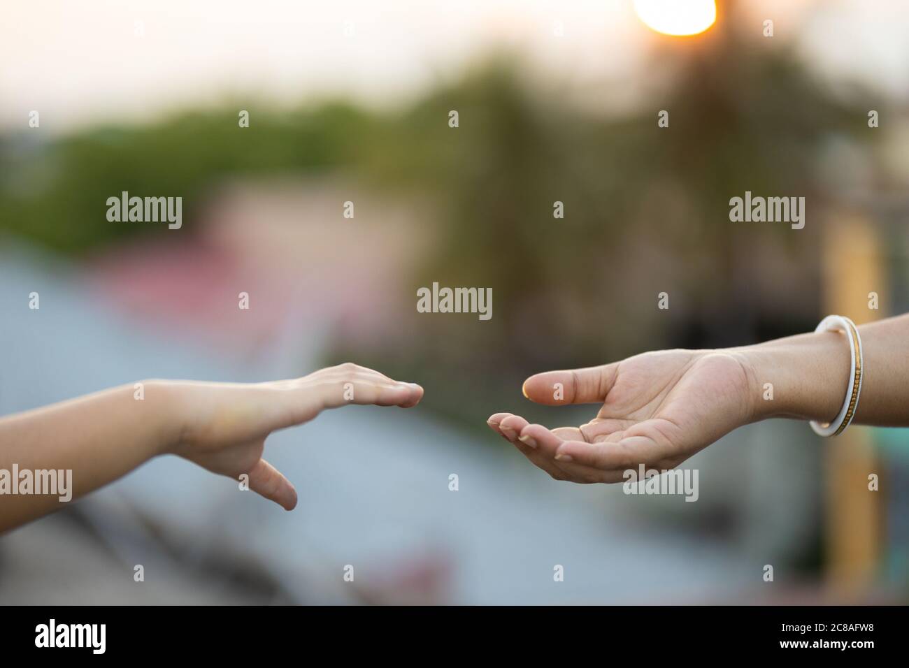Hand reaching out to another hand hi-res stock photography and images ...
