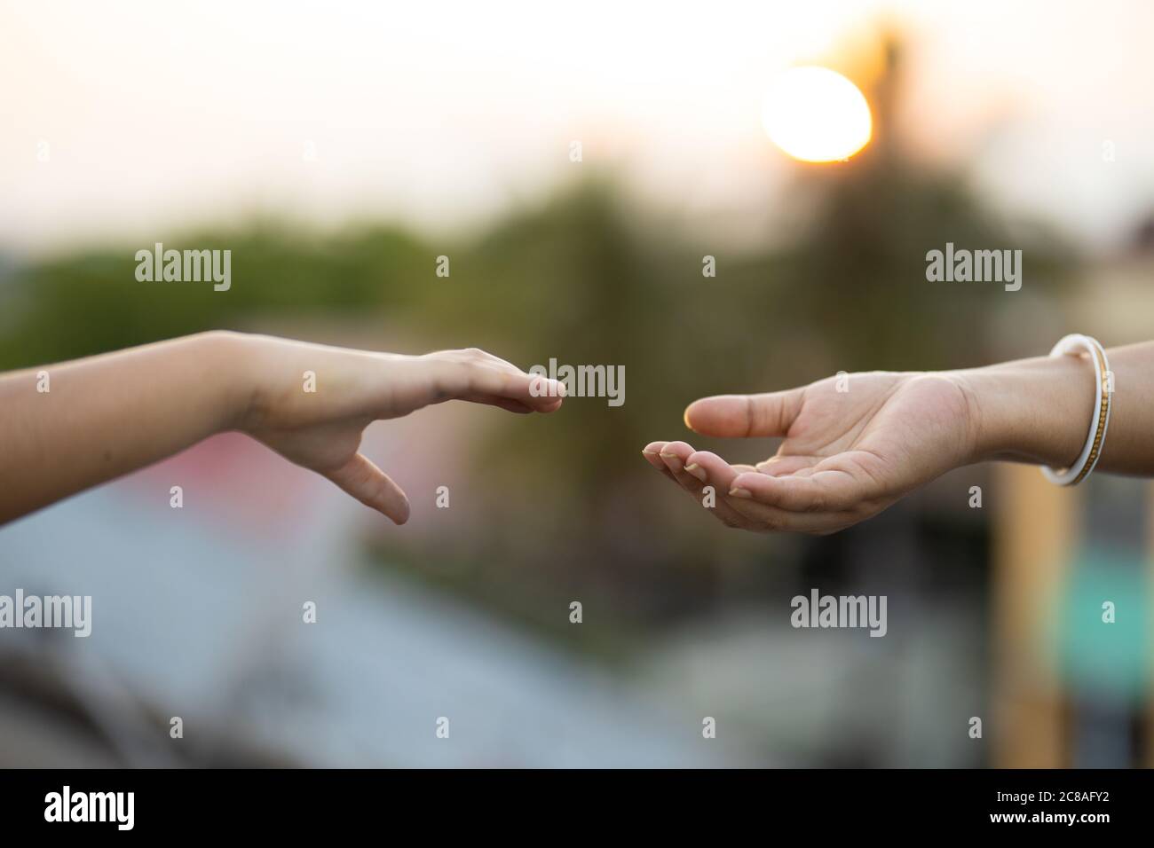 Hand reaching out to another hand hi-res stock photography and images ...