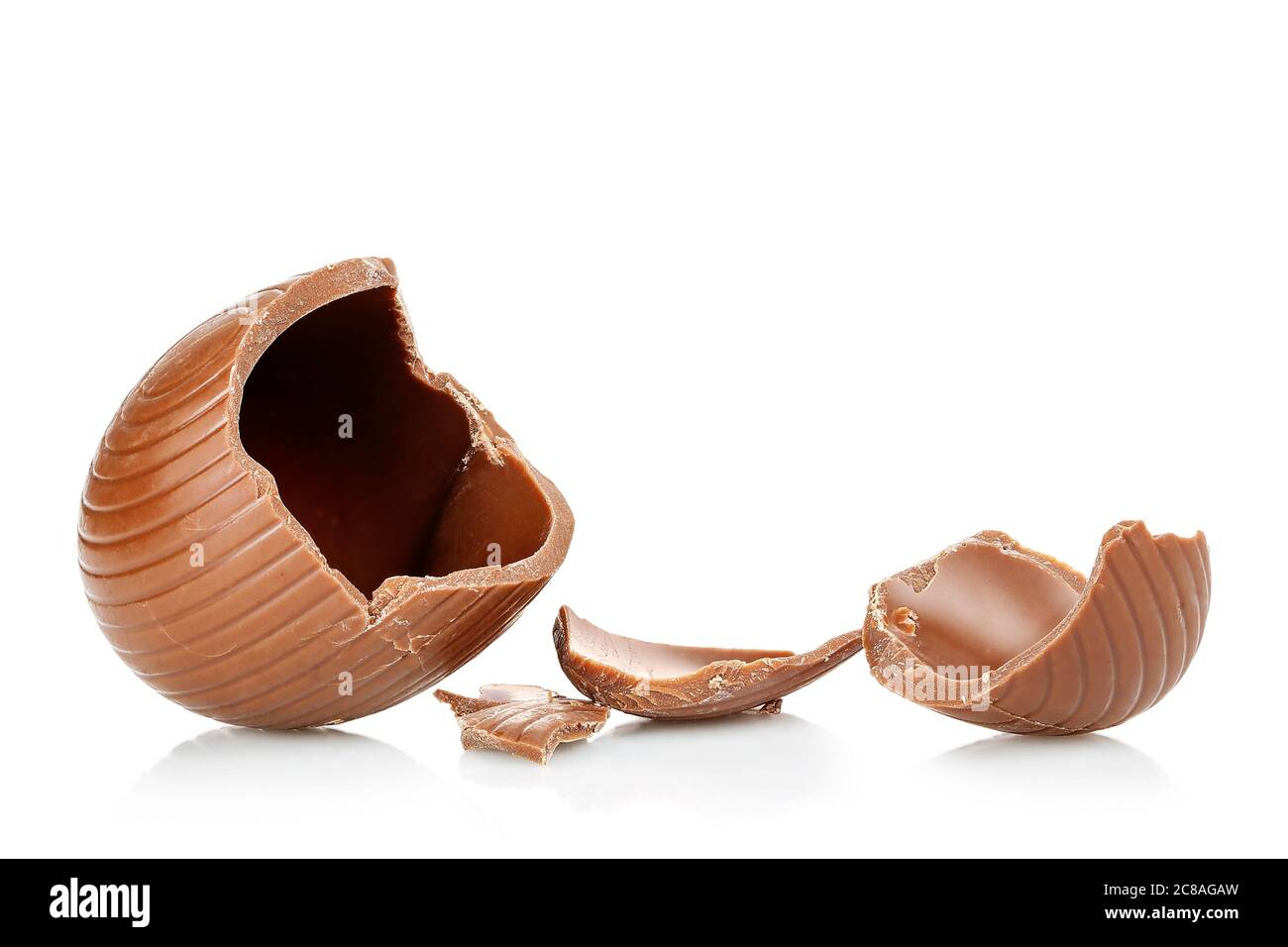Cracked chocolate egg Cut Out Stock Images & Pictures - Alamy