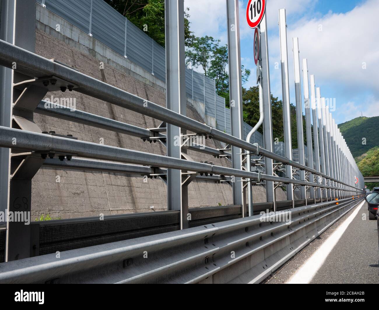 Guard rail and series of metal poles used to support the sound ...