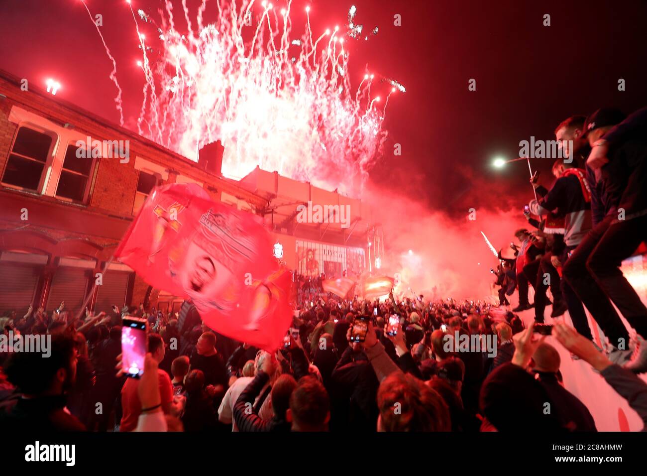 Liverpool fans set flares outside anfield hi-res stock photography and ...