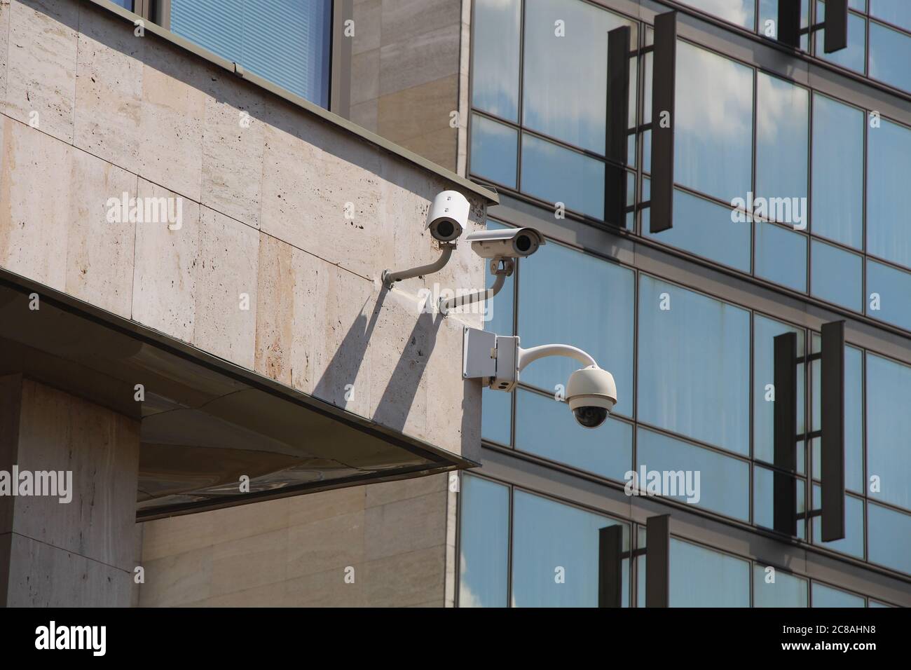 CCTV cameras installed on the exterior wall of a police building in ...