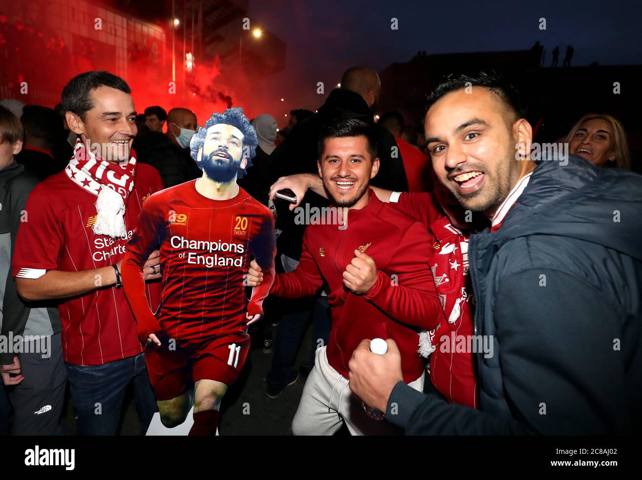 Liverpool fans celebrate outside Anfield Stock Photo - Alamy