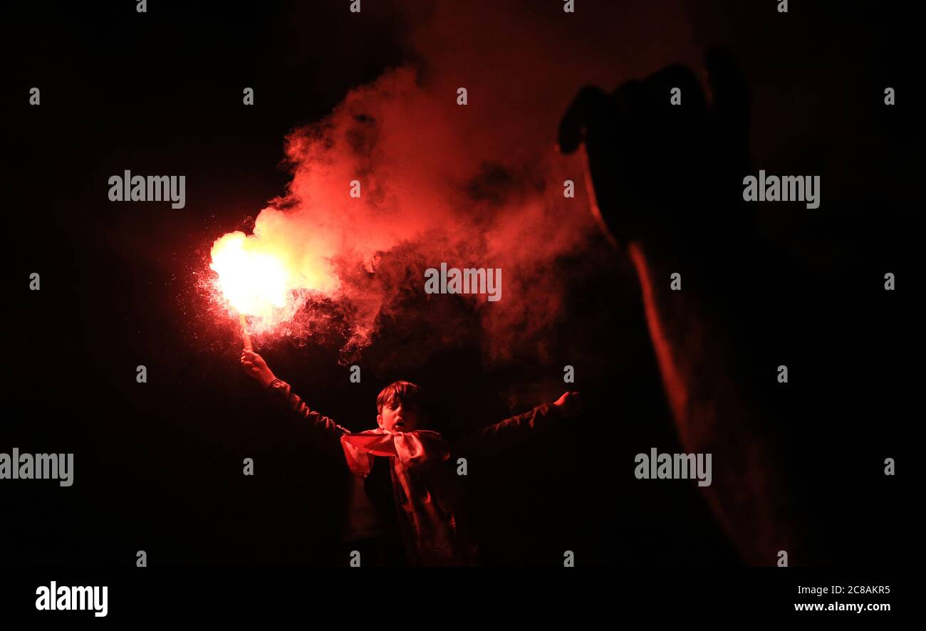 Liverpool fans with flares following their trophy presentation at ...