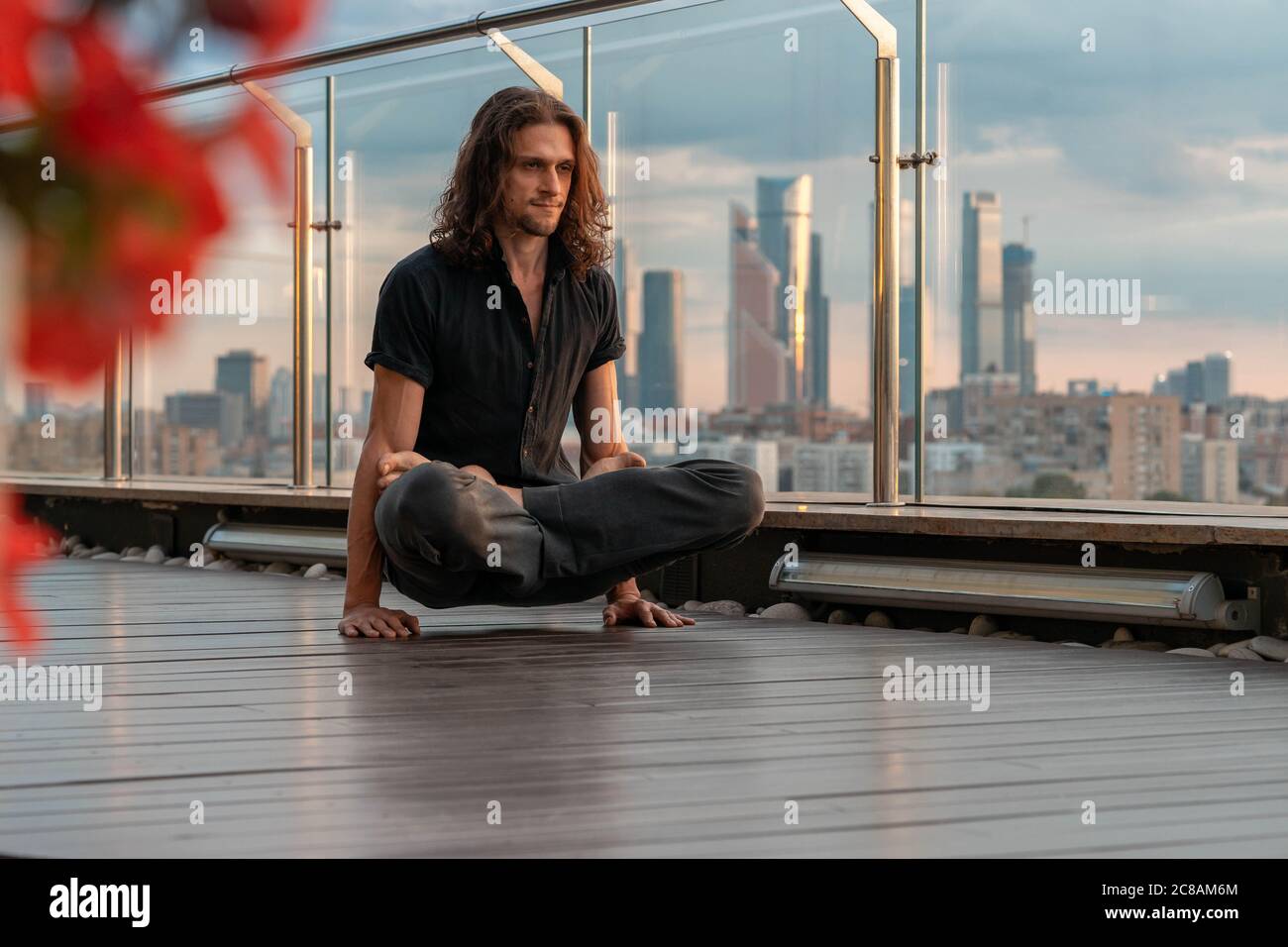 Handsome Young Man Leaning on Hands and Levitating Above Floor ...