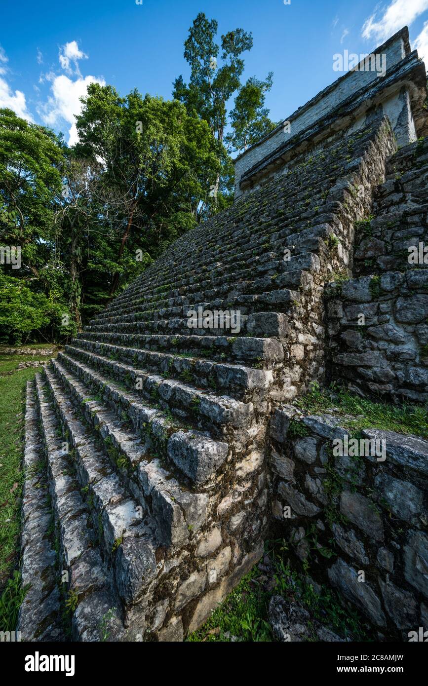 Very steep stairs in front of Temple II at the ruins of the Mayan city ...