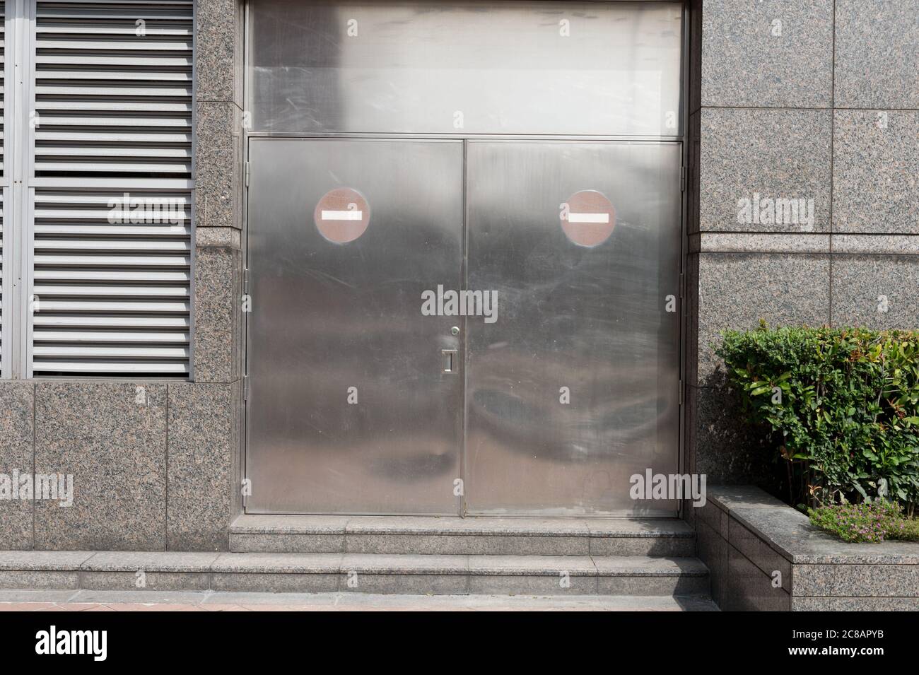 sidewalk by street wall & door Stock Photo - Alamy