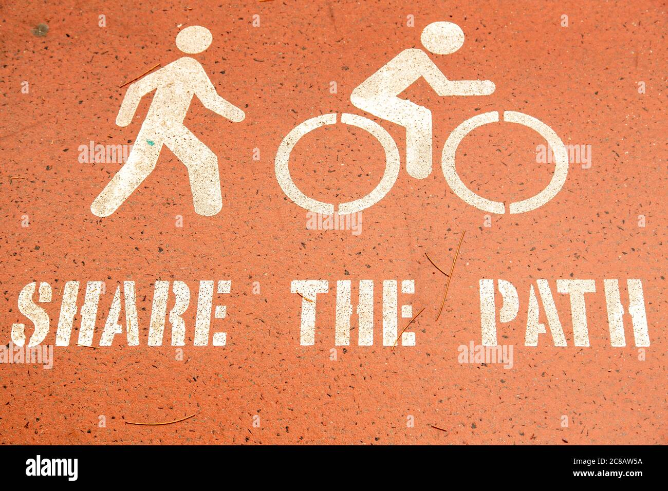Share the path signage on footpath Stock Photo - Alamy