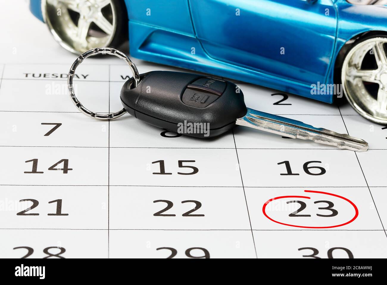car key on calendar and circled date, concept for new car Stock Photo ...