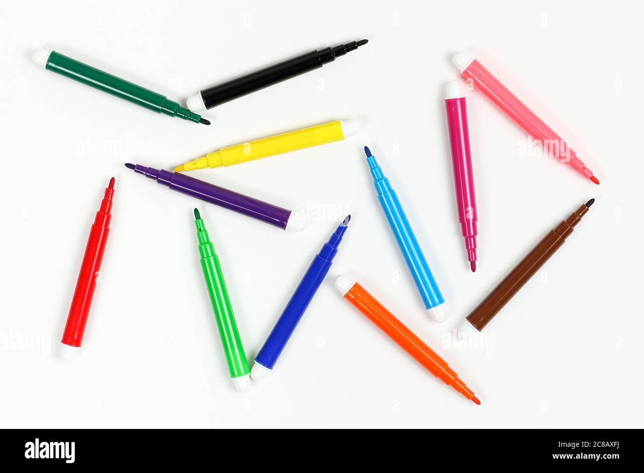 collection of colorful markers on white Stock Photo - Alamy