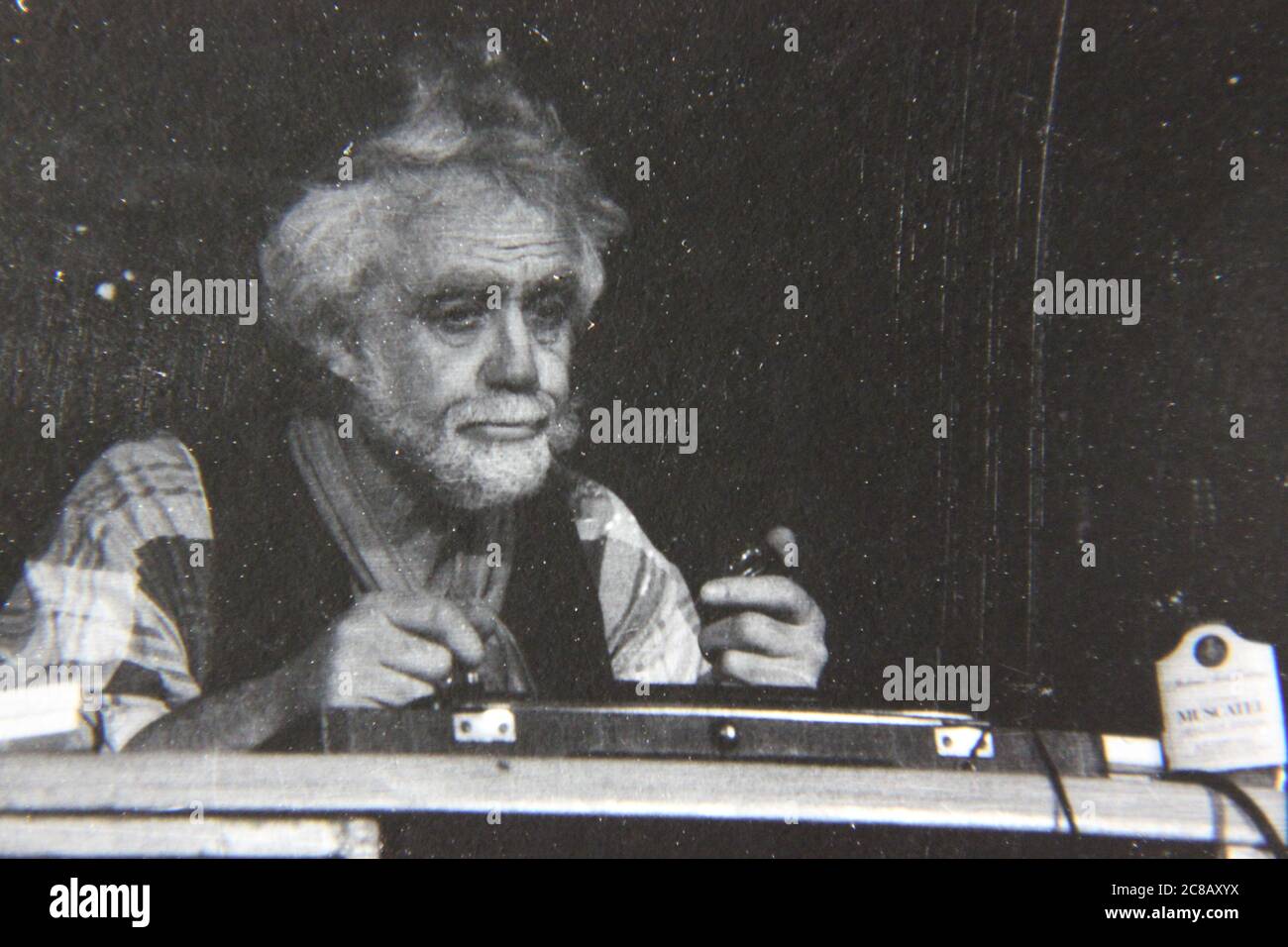 An older actor staging a dramatic and emotional performance while ...