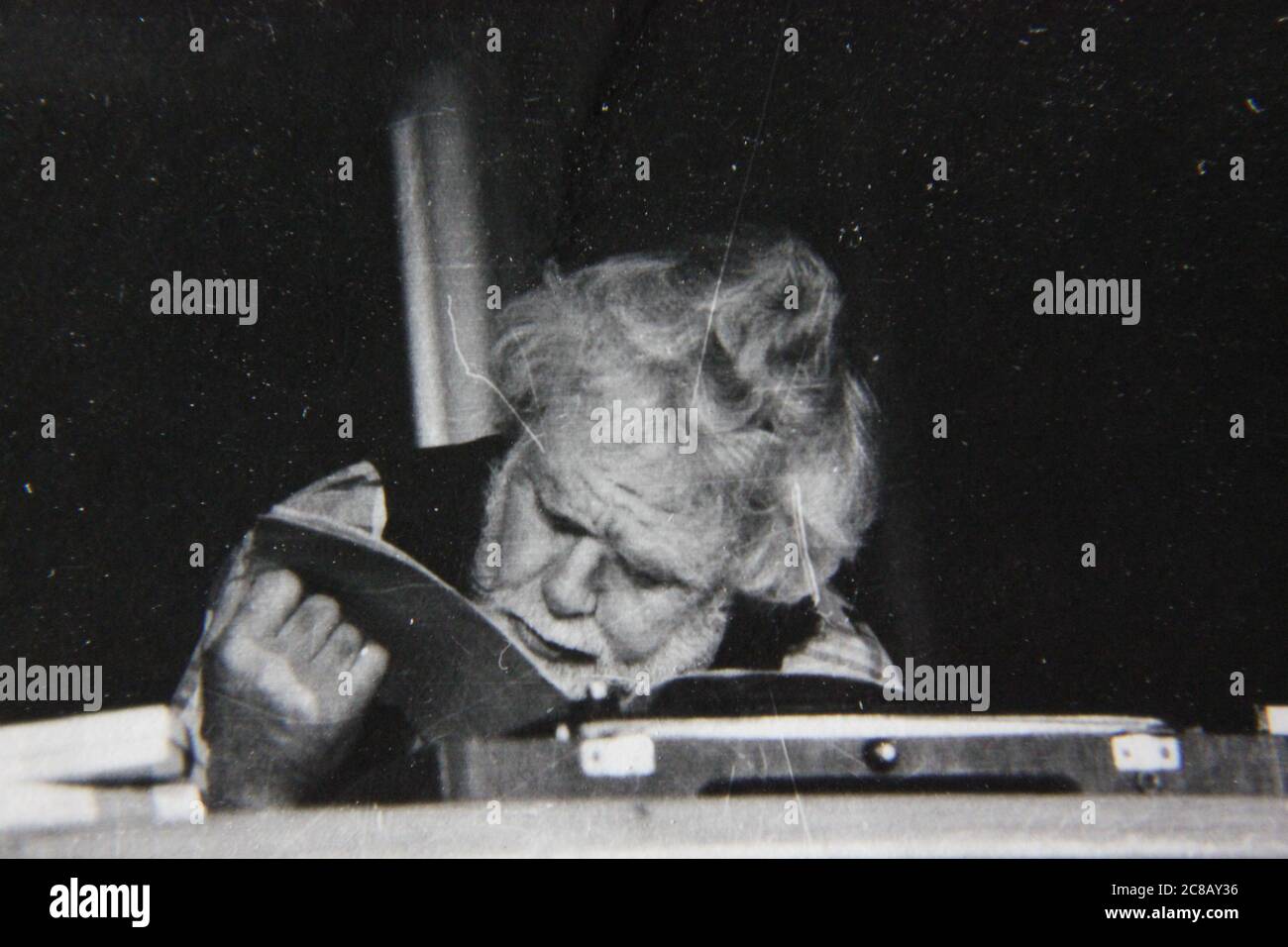 An older actor staging a dramatic and emotional performance while ...