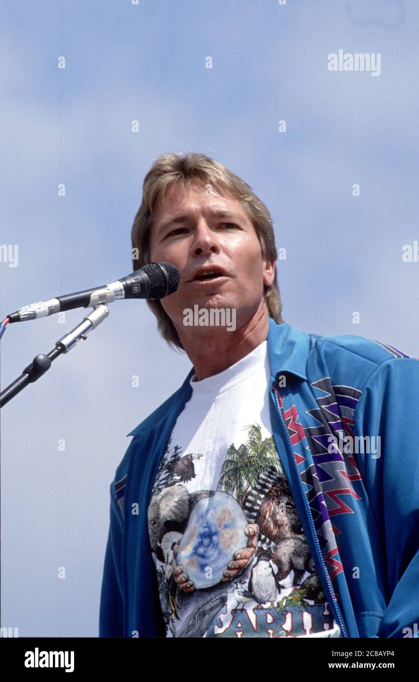 Singer John Denver performs at an Earth Day rally at the United States ...