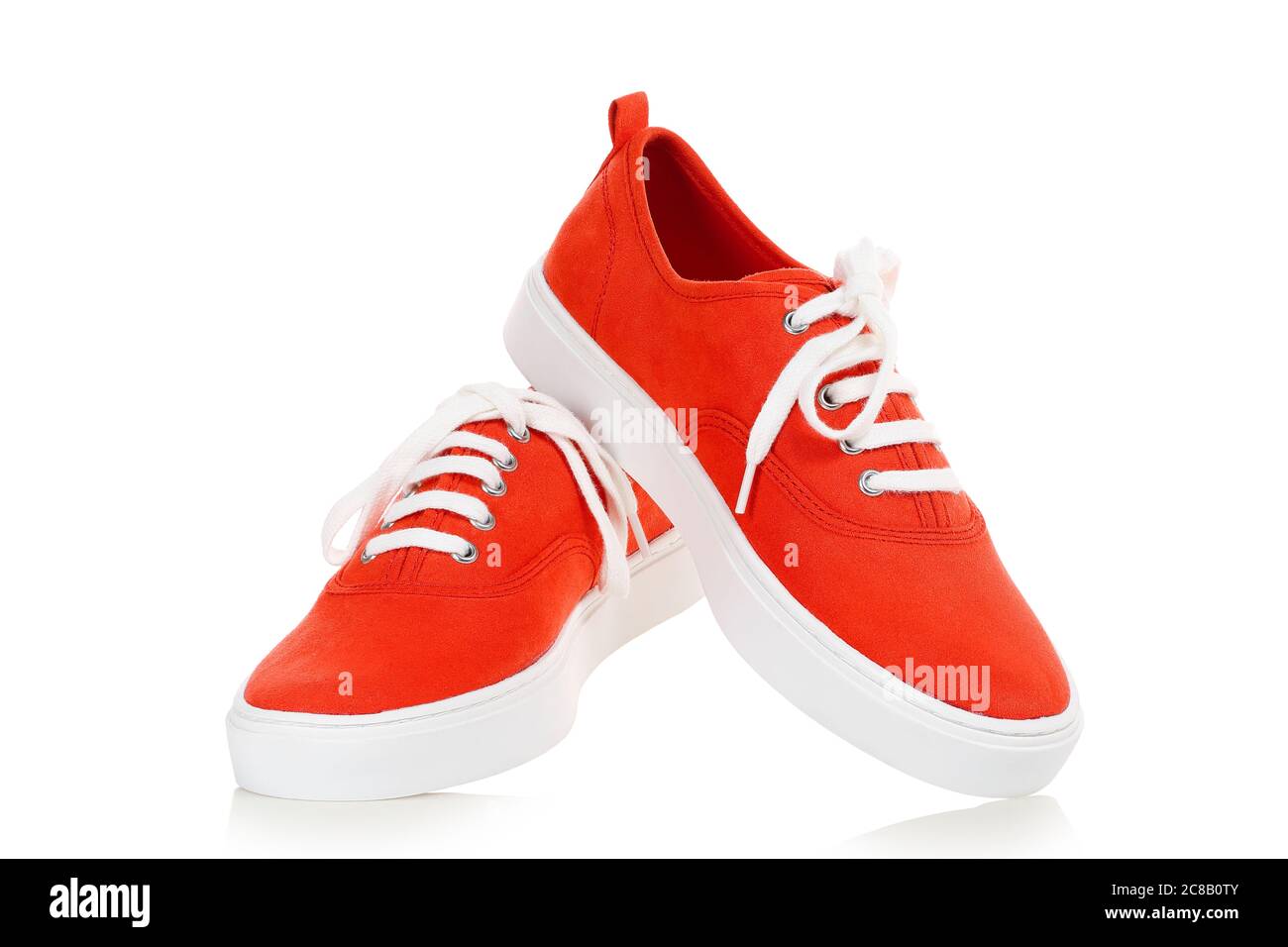 pair of red suede shoes isolated on white Stock Photo - Alamy