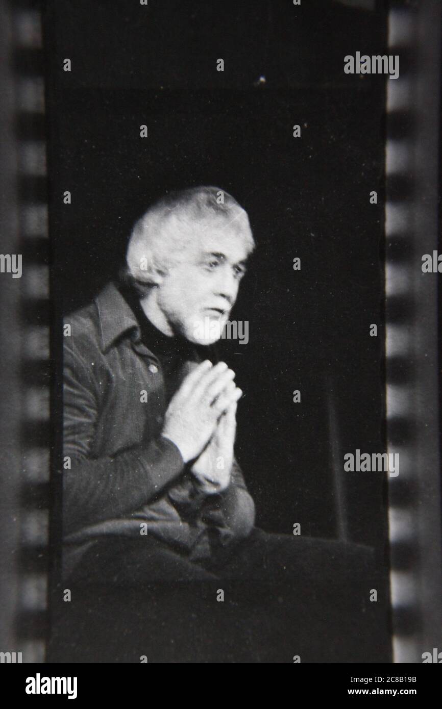 An older actor staging a dramatic and emotional performance while ...