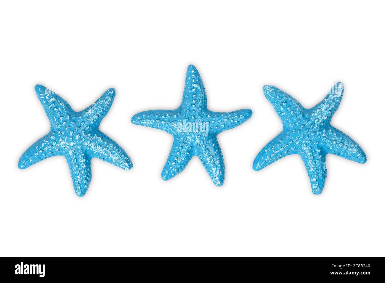 three blue starfish on white isolated Stock Photo - Alamy