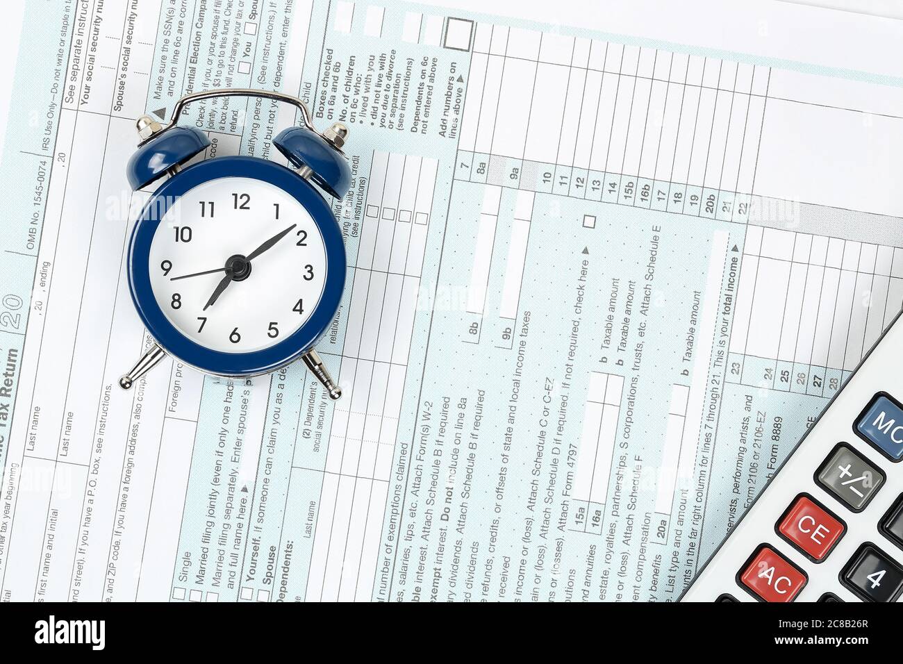 Tax document money alarm hi-res stock photography and images - Alamy