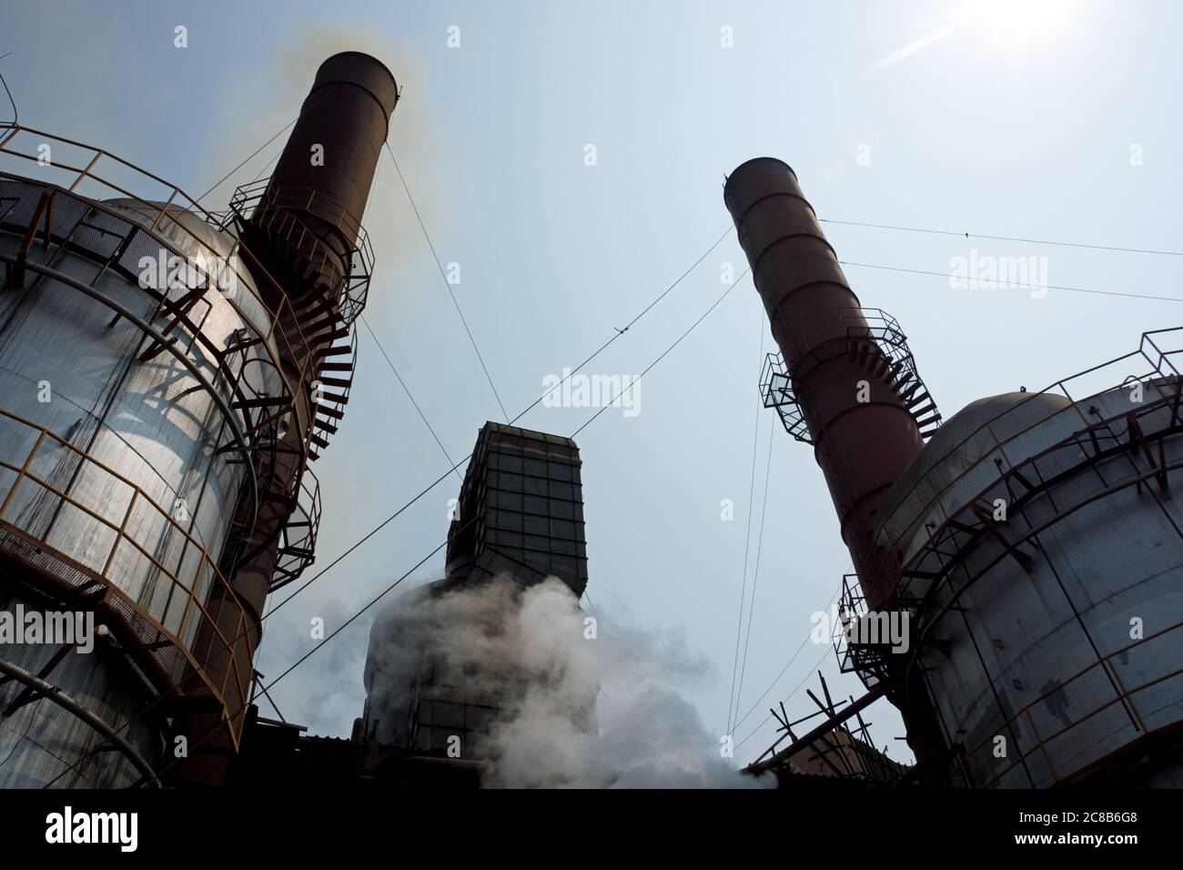 Sugar mill processing plant and refinery with steam chimneys in ...