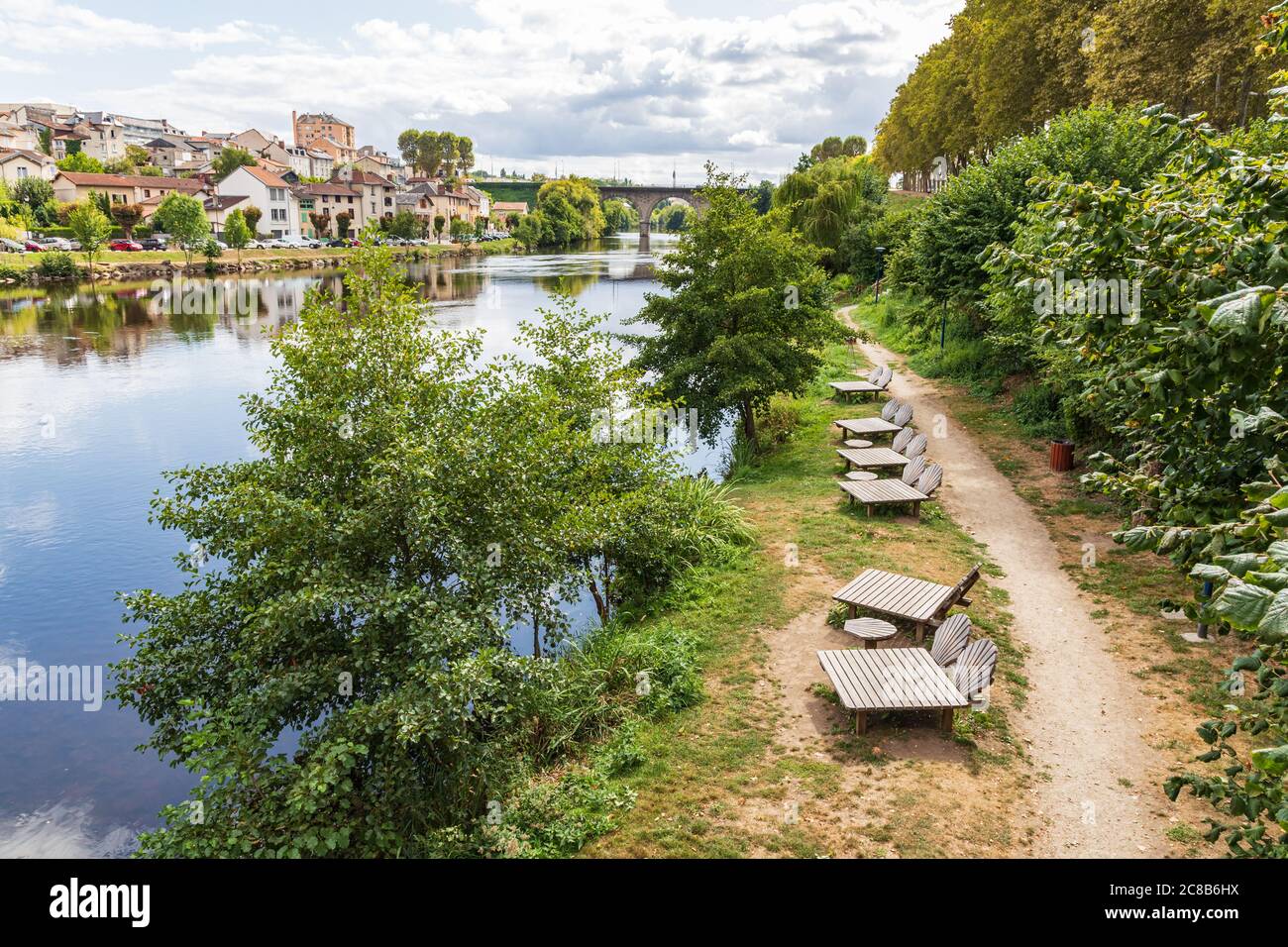 Europe, France, Haute-Vienne, Limoges. Chaise lounges on a pathway ...