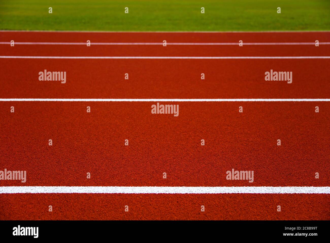 Closeup of the red stadium running track Stock Photo - Alamy