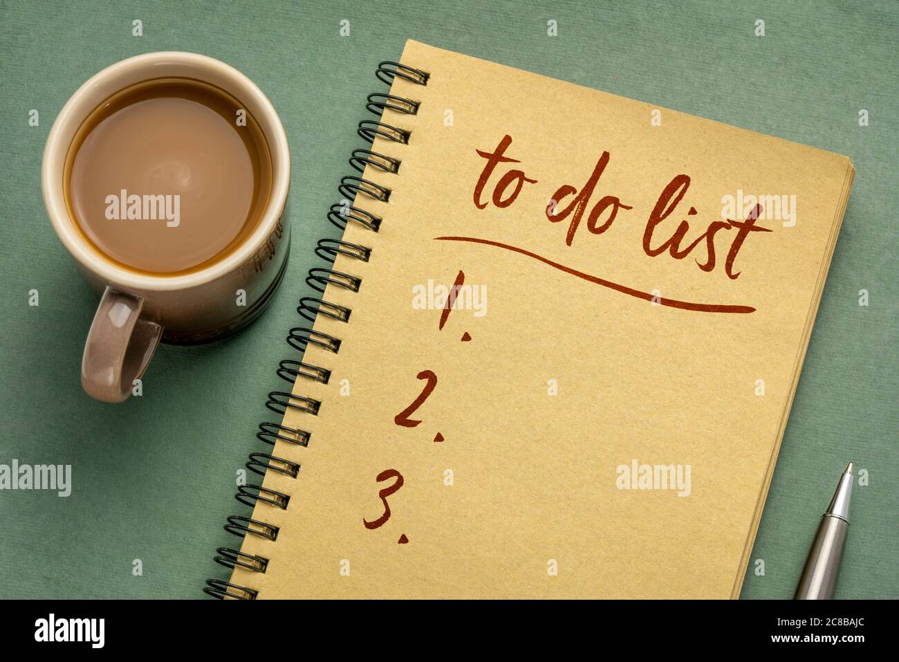 to do list handwriting in a spiral notebook with a cup of coffee ...
