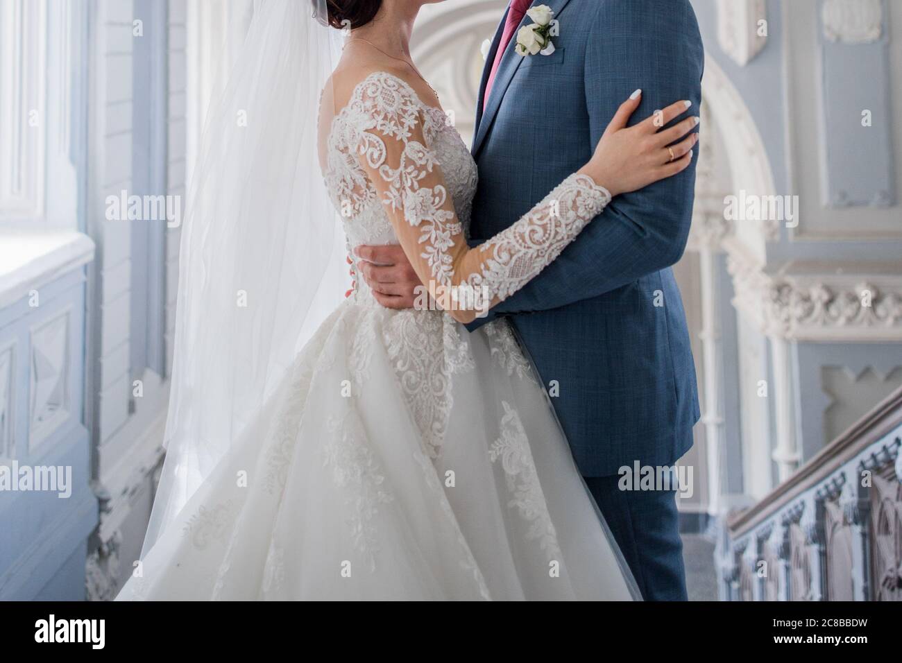 bride and groom at wedding in an old building Stock Photo - Alamy