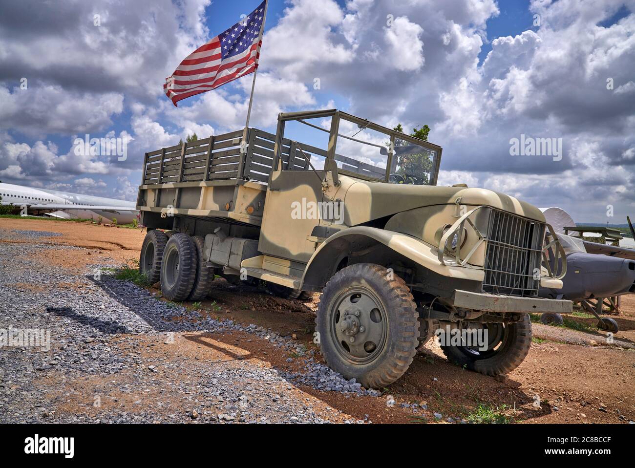 Truck USA Army WW2 vehicle. Coffee War reconstruction site with vintage ...