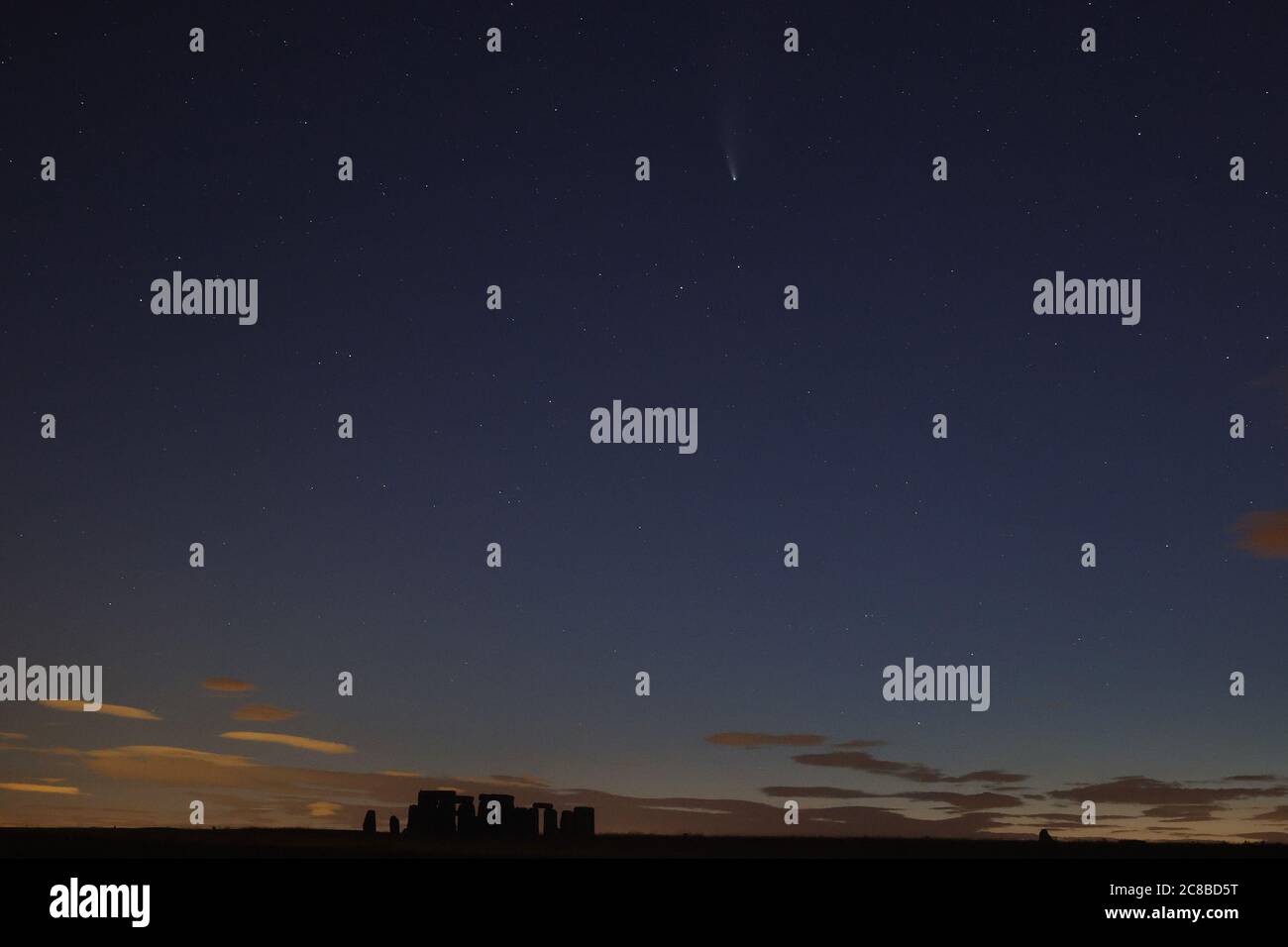 Comet Neowise appearing in the night sky over Stonehenge in Wiltshire ...